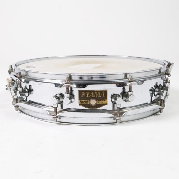 【中古】 ピッコロスネアドラム タマ TAMA MT433 STEEL PICCOLO 14x3.5  TAMA MT433 STEEL PICCOLO 14x3.5 の中古品です。  使用感のあるコンディションです。 商品内容：本体のみ ...