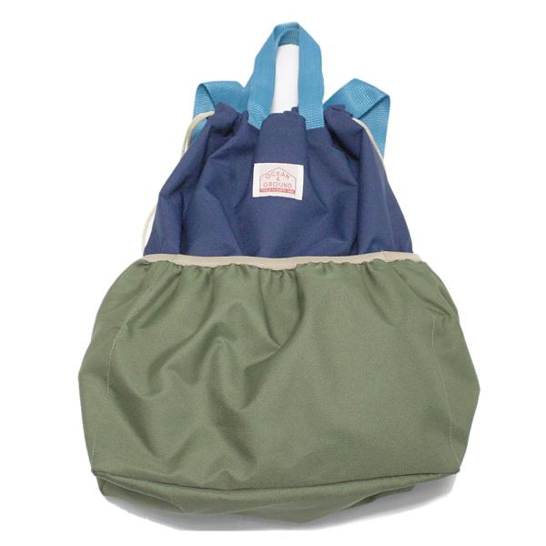 Ocean＆Ground（GOODS） オーシャン＆グラウンドグッズ“オーシャン＆グラウンド”の巾着リュック配色を切替えたデザインが目を惹くリュック。巾着型でコンパクトながら、マチがあるので容量がたくさん入るのも嬉しいポイント◎外側に大きな...