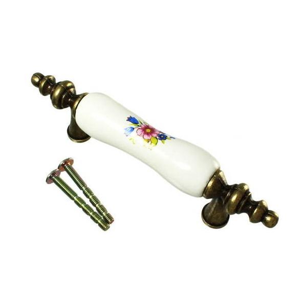 引き出しや扉の、お手軽な模様替えにオススメです。家具タンスの取っ手・ツマミシリーズ家具扉・引出等の取っ手。裏側からビスで止めるタイプの取っ手です。■サイズ：76mm■取付：裏ビス止■カラー・仕上：ゴールド/ホワイト(花柄)■本体：亜鉛ダイカ...