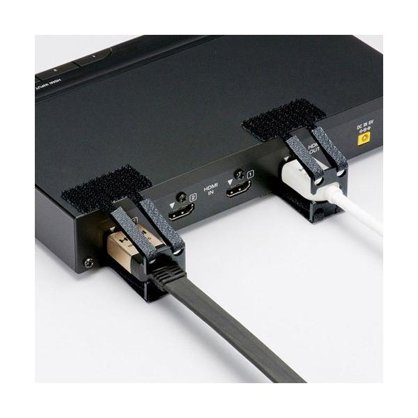 HDMIプラグが誤って抜けるのを防止するホールドロック（R）。■ HDMIプラグが誤って抜けることを防止します。■ HDMIホールドロック（R）は、プラグを押さえるマジックフッカー（樹脂）と機器側へ取り付ける、固定するための粘着付き面ファス...