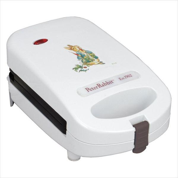 ■商品紹介：ピーターラビットの焼き印でかわいいホットサンド朝食を。プレートはフッ素樹脂加工でお手入れ簡単。ホットサンドが一度に2個作れます。  ■商品内容：本体（約203×119×102mm）×1  ■材質：PF（アクリル塗装仕上）・ABS...