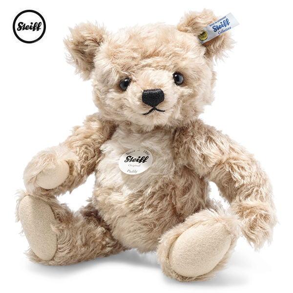 世界中の人々に愛され続ける名作ベアのパディです。美しく深みのあるライトブラウンのモヘアで覆われ、色分けされた胸元のホワイトモヘアがワンポイント。クラシカルベアの持ち味を活かしながらも、顔とボディの丸いシェイプがかわいらしく、少し曲げられた腕...