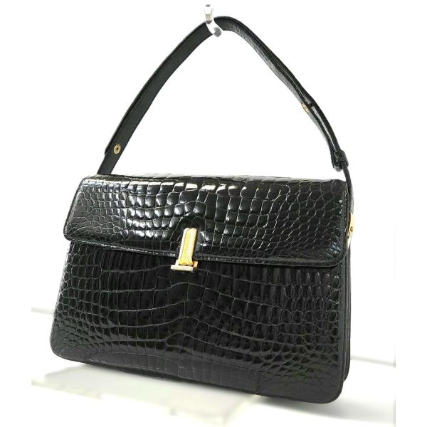 USED(中古）B＋ランク ※内側に少々の汚れ等ありますが目立つものではなく、ダメージの少ない良品です。★☆★☆★☆★☆★☆★☆★☆★☆★☆★☆イタリア製クロコダイルのブラックハンドバッグです。フラップ式デザインとゴールドトーン金具が特徴。...