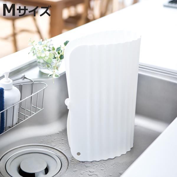 サイズ/約横46.8×縦31.8cm厚さ：約0.6cm内容量/1枚材質/シリコーンゴム耐熱温度/200度●使った後は立てて乾かせる、シリコーン製のLサイズシンクマットです。●波形が熱やキズからシンクを守ります。●熱い鍋やフライパンが置けます...