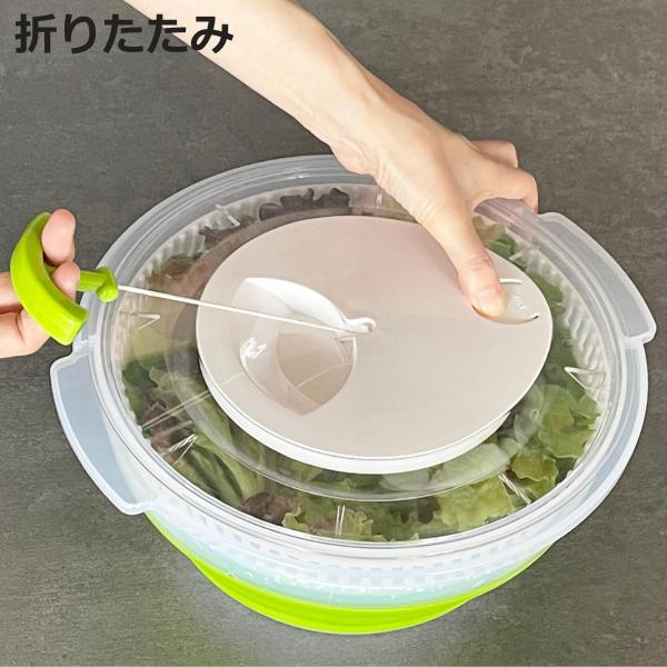 サイズ/約幅30.5×奥行28.5×高さ14cm折りたたみ時：高さ 約7cm重量/約1kg内容量/1個材質/PP・TPR・AS・ABS 生産国/中国製●コンパクトに折りたためるサラダスピナーです。●シンク下など薄型の引き出しに収納できます。...