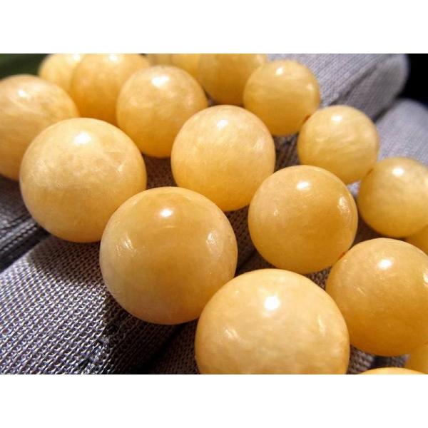 ■サイズ・重さなど：サイズ 10ミリ 約38-40cm 大量の場合はお気軽にお問い合わせ下さい!■産地・原産国：メキシコ産■グレードなど：2A■名称など：ハニーカルサイト【方解石】■商品説明：オレンジカルサイトカルサイトは天然石の中でもメジ...