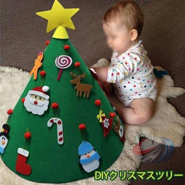 商品名:DIYクリスマスツリー   素材:フェルト   サイズ(約)：高さ70cm、幅50cm   セット内容:ツリー、飾り物   生産国:中国   鮮やかな色、フェルト生地で暖かく喜び雰囲気に、   簡単に掛けることができ、   子どもも...