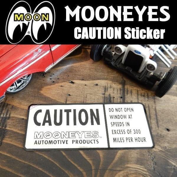 メタリックな風合いがとても COOL !! なコ−ションステッカー。どこに貼るかでセンスが光ります !MOONEYES CAUTION STICKER DM165CAUTION（警告する！）ステッカーサイズ： 4cm × 10cm ミラーコ...