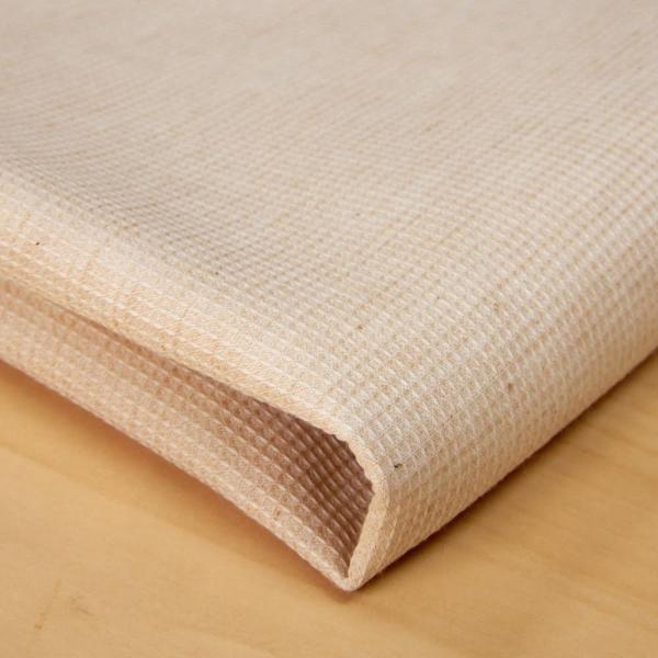 オーガニックコットンのワッフル生地です。ワッフルの凹凸１マスの大きさは、約横2mm×縦2mm程度です。柔らかく、さらっとした肌ざわりです。お洋服、寝具や、パジャマ、キッチンまわりの布雑貨など、様々なシーンでお使い頂けます。吸水性が良いので、...