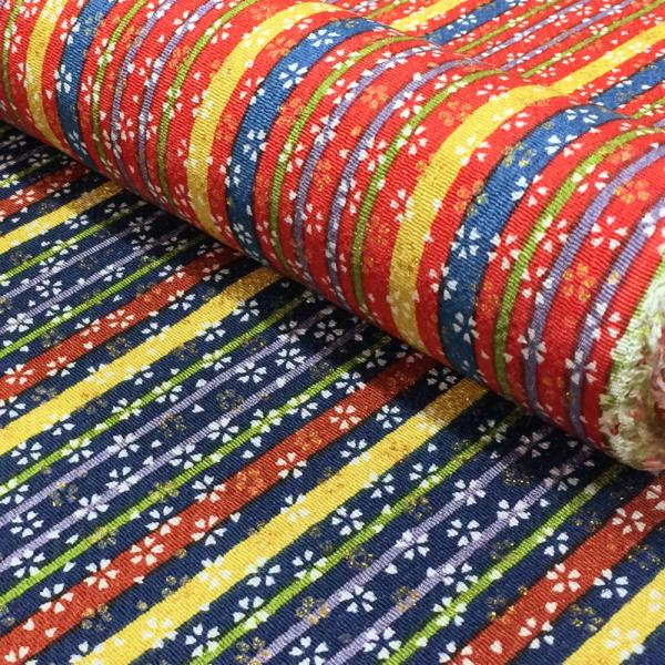 手芸用のちりめん生地。カラフルな縦縞に桜のおしゃれなちりめんプリント。つるし雛やつまみ細工などの縮緬細工などにオススメです。※色落ちや縮みの原因となりますので水洗いはお避けください。※ラメ部分は、こすれなどで落ちる可能性があります。◎50c...