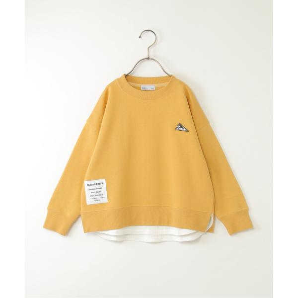 寒い冬でも安心な裏起毛トレーナー。インナーを着ているようなレイヤード風デザインは、一枚でしっかりおしゃれ。胸元のワッペンやサイドスリットなど、ディテールにこだわった一着です。【素材】あったか裏起毛。【デザイン】裾フェイクレイヤード。【ikk...