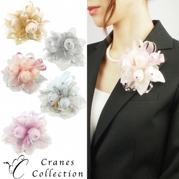 ■素材 金具：合金花びら部：合成繊維■サイズ 直径約10cm　※平置きの実寸サイズです。製品により多少の誤差が生じる場合がございます。　■重さ：約14g■カラー ゴールド・シルバー・ピンク・ブルー・パープル■商品お届け荷姿 当社スタッフがし...