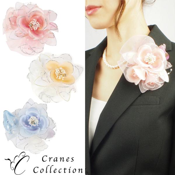 ■素材 金具：合金花びら部：合成繊維、ラインストーン、アクリルビーズ・パール■サイズ 直径約11cm　※平置きの実寸サイズです。製品により多少の誤差が生じる場合がございます。　■重さ：約10g■カラー ピンク・ホワイト・ブルー■商品お届け荷...