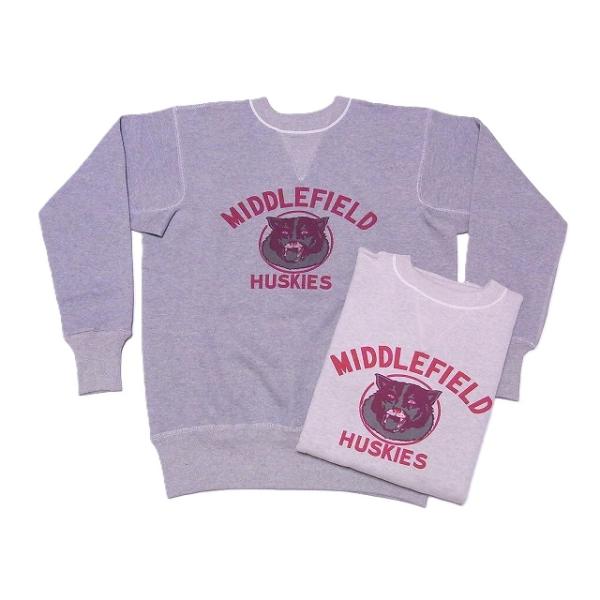 ウエアハウス(WAREHOUSE)のセットインフリーダム・スウェット"403/MIDDLEFIELD"です。古着の風合いを再現するために最も適した吊編み機を使用。染めカラーの表糸には18番の米綿を使用、オートミール、杢グレーには繋ぎの40番...