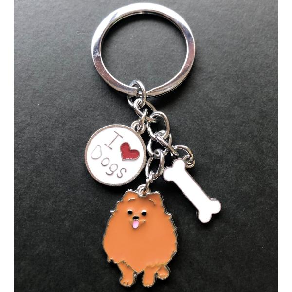 ご覧いただきまして誠にありがとうございます。愛犬お出かけの際にお揃いバックチャーム にお勧めです！ 犬デザイン キーホルダー ラブ ●ポメラニアン スピッツ　ブラウン犬のサイズ 縦 約2.5cm 横 約2cm ※裏面は無地です。リングサイズ...