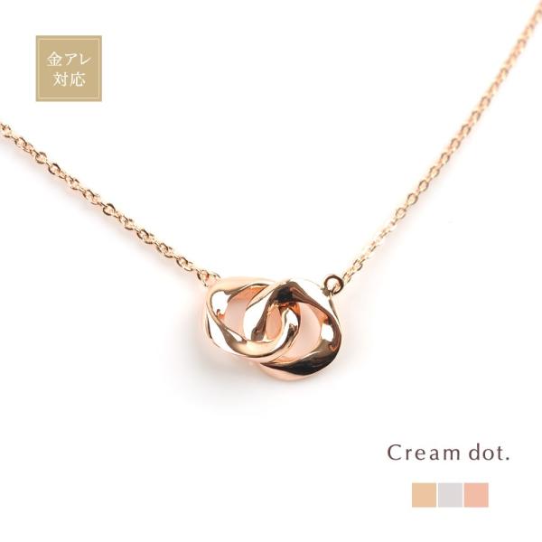 ねじれたサークルモチーフを2つ連ねたネックレス。シンプルに見えて個性的なデザインは、女性のデコルテを美しく引き立ててくれます。どんなコーデとも相性がよいので、デイリーにオススメのアイテムです。■サイズモチーフの大きさ（縦×横×厚み）0.8c...