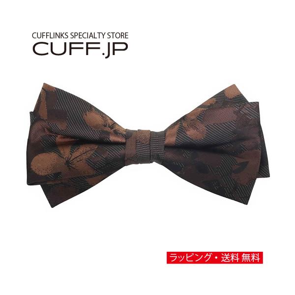 2枚のリボンをあえて少しずらした変形型の蝶ネクタイ。長さを調節し、フックで留める簡易装着タイプ。ご自身で結ぶ必要なく簡単に装着出来ます。カラー：ダークブラウンスタイル：バンド　簡易タイプ素材：ポリエステルネックサイズ：約28.0cm〜48....