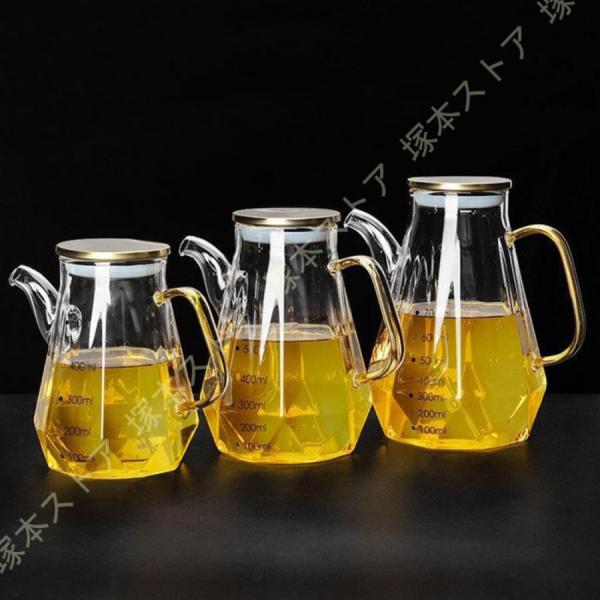 商品の説明500MLサイズ：7.5×13.5cm、700MLサイズ：8×15.5cm、900MLサイズ：9×17.2cm製品の形状は寸法図によって表示される形状と同じである包装は空気柱で梱包します色：透明素材：ステンレス+ガラス目盛りがオイ...