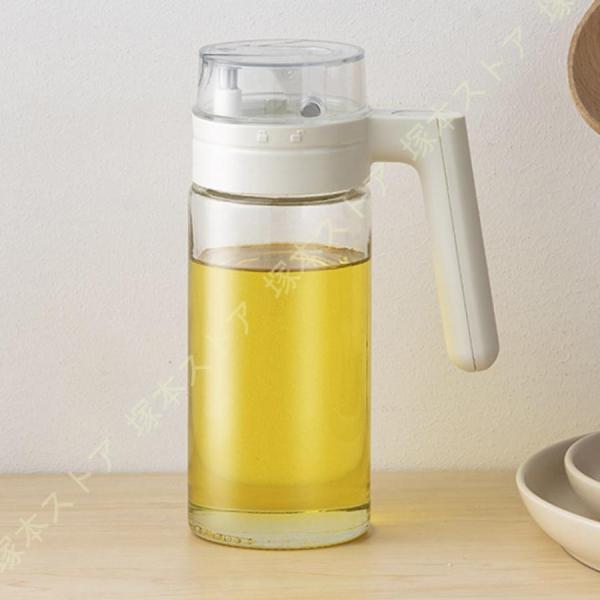 商品の説明容量：550ml/700ml色：ホワイト/オレンジ素材：ガラス+PP目盛りがオイルポットオイル差しのガラスには目盛りが付いており、油の使用量を適切に管理でき、注ぎすぎの心配がなく、とても便利でわかりやすいです。計量カップとしてもお...