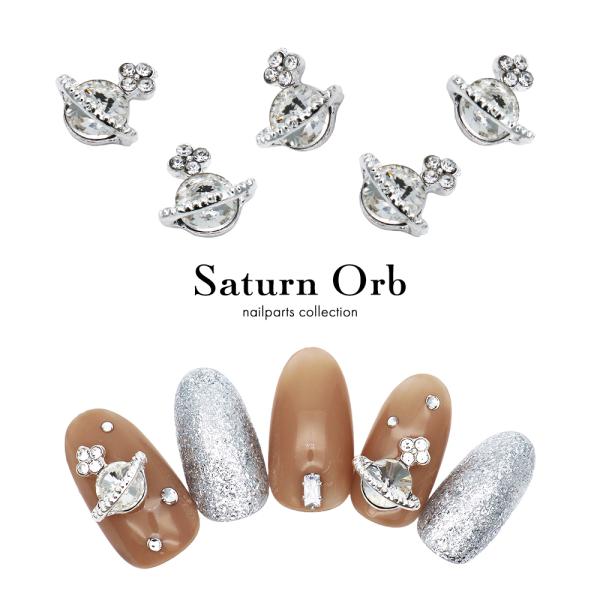 【特徴】大きめストーンの土星オーブモチーフ○゜存在感のある大きめサイズなのでロングネイルやイベントネイルにぴったり☆ハンドメイドアクセサリーやピアスにも！立体的で高さのあるパーツなのでゴージャスな印象に仕上がる！【カラー】シルバー【サイズ/...