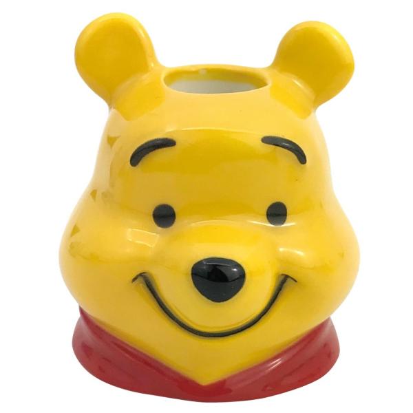 ダイカットハブラシスタンド くまのプーさんインパクトのあるかわいいダイカット歯ブラシ。歯ブラシが楽しくなりそうなアイテムです。サイズ：W5×D5.4×H5.5cm材質：陶磁器生産国：日本