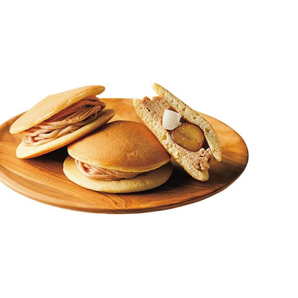 ふんわりとした風味豊かな生地にモンブランあんと渋皮付き一粒栗・求肥餅を挟みこみました。和と洋の美味しさが重なる創作菓子です。商品内容モンブランどら焼き×6個商品サイズ(mm)：約270×190×120重量(g)：約800賞味期限：製造日より...