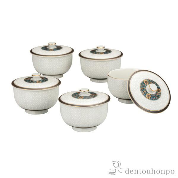 白七宝が描く美しい模様は、九谷焼の伝統技法の結晶。優雅な蓋付汲出茶器セットで、茶葉が奏でる香りとともに静かなひとときを贈ります。一つひとつが職人の手で丁寧に仕上げられたこの逸品は、日常に特別な彩りを添え、大切な方への贈り物としても喜ばれるこ...