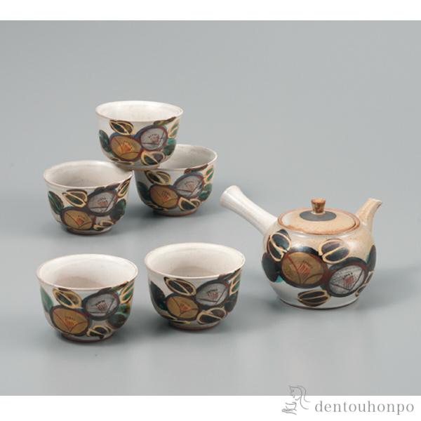 優雅な九谷焼の茶器セットで、心安らぐひとときを。金銀彩の山茶花模様が、美しいハーモニーを奏でます。一杯の茶が、豊かな芸術と共にこの上ない癒しを届けます。日常に彩りを加え、特別な時間を演出するための完璧なパートナーです。大切な方への贈り物にも...