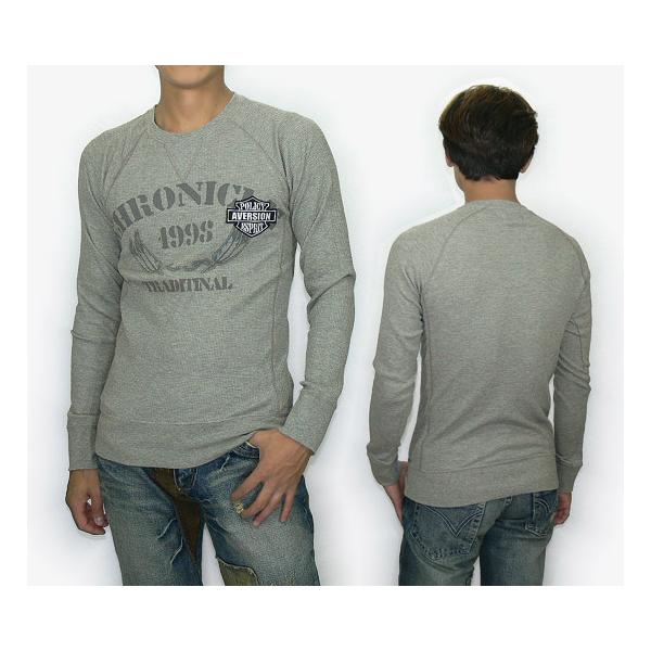 THE GUNNERS ラインステッチが特徴的なワッフル素材のロンT！伸縮性のある素材を使用しており、タイトなスタイルに仕上げています！袖先部分と裾部分には天竺の変化を付けたリブ！ワッフル素材を使用しており、フロントにプリントとワッペン付！...