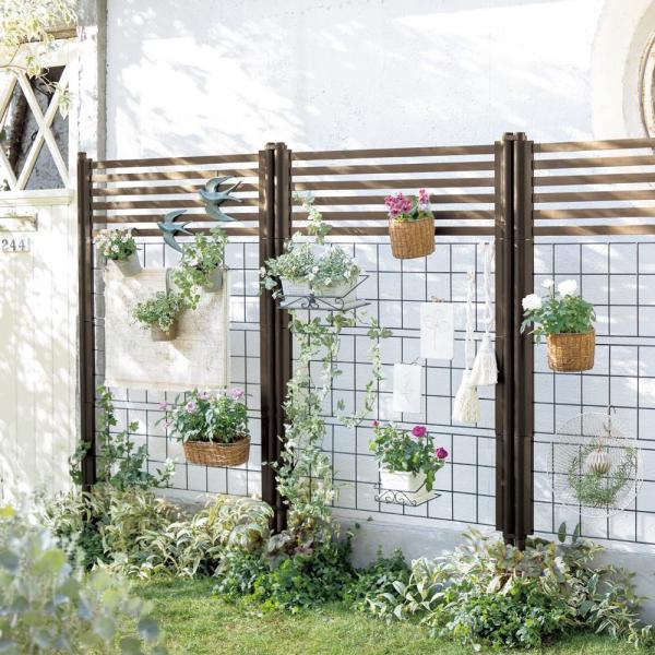 目隠しガーデニングフェンス 高さ150 玄関 ガレージ周り ディノス dinos 人気 おしゃれ目隠しとガーデニングを両立。視線は気になるところだけカット。トレリスフェンスには緑豊かに成長する植物のアレンジができます。