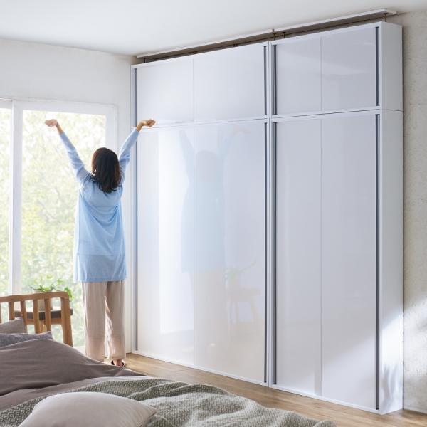 光沢仕様 引き戸壁面収納本棚 幅150奥行40高さ180cm 本棚 ラック シェルフ CD DVDラック ディノス dinos 人気 おしゃれ扉の光沢が美しい、壁に溶け込むシンプルスライド扉収納庫◆文庫や新書、CD・DVDなど、どんどん増え...