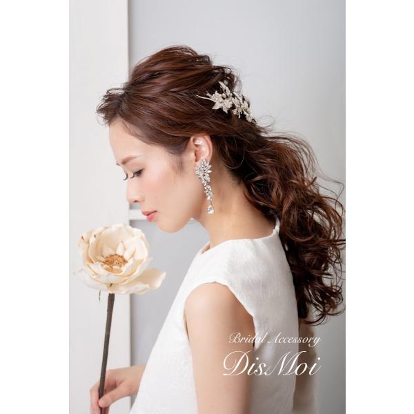 Bridal Accessories Dis Moiブライダル アクセサリーズ ディモアクリスタルピアス/イヤリング ≪CPES-05≫大粒のクリスタルが特別な存在感を放つピアス/イヤリングです。大小のクリスタルが贅沢に配置された大ぶりのデ...