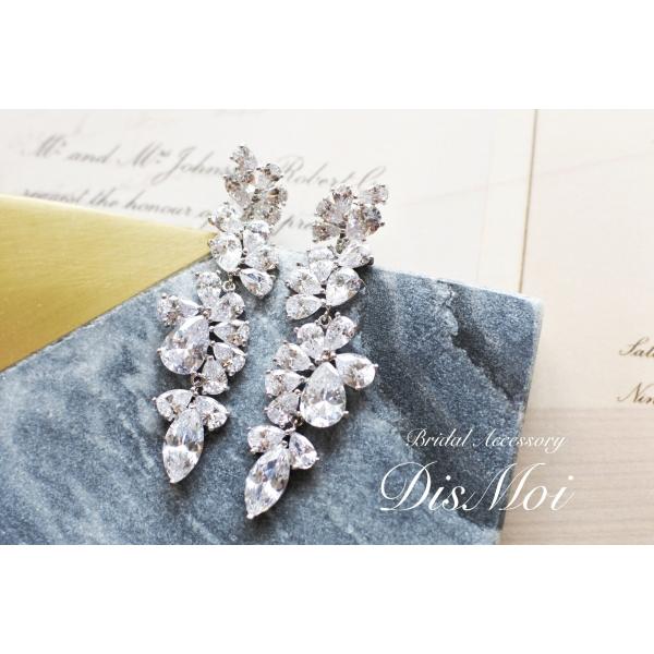 ジルコニアイヤリング ≪ZE-26≫- DisMoi Original Series -DisMoiオリジナルのイヤリングです。様々な大きさのティアドロップ型のジルコニアストーンが連なったラグジュアリーなイヤリングです。華やかながらシンプル...