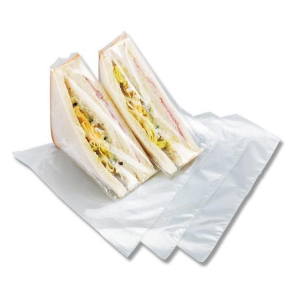 三角型サンドイッチ専用の無地ポリ袋です。 サンドイッチの厚みを見越して台形のシルエットになっています。 食品衛生法規格基準適合商品です。   【サイズ】 0.025×90×220×200mm 【カラー】 透明 【入数】 200枚 00677...