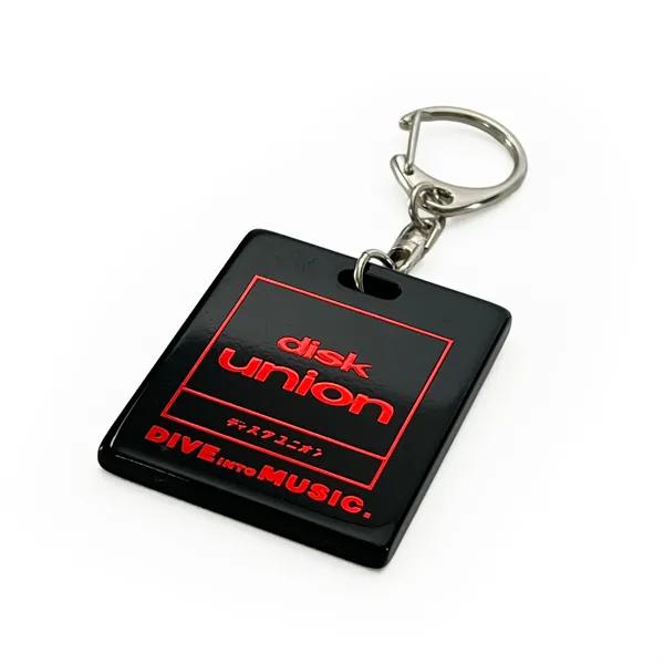 ディスクユニオンのショッパーをモチーフにしたアクリルチャームが新登場。5mm厚のアクリルを採用。両面のロゴは箔押しプリントで仕上げており、角度によって輝く光沢と立体感のある質感が特長です。バッグやお気に入りの小物に付けて、チャームとしてお楽...