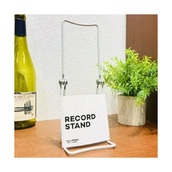 シンプルなレコードスタンド。背になる部分を拡げるとLP、折り畳むとEPやCDのスタンドとして使用できます。