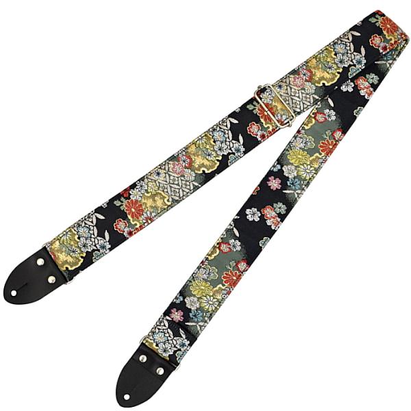 日本を代表する絹織物「西陣織」の布で作ったギターストラップ。色とりどりの先染め糸を用い、彩り豊かに緻密に織り上げられる文様の美しさを生かした一品です。金や銀の糸が織り込まれているため、ライトが当たるとキラキラと光り演奏会などでも存在感を発揮...