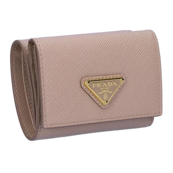 プラダ PRADA上質レザーが気品と上質さを漂わせるPRADAのコンパクトウォレット。正面のブランドロゴがポイント。ミニバックにもすっぽり入るので、セカンドお財布としてもお勧め。【サイズ（約）】縦/約7cm横/約9.5cm【仕様】開閉/スナ...