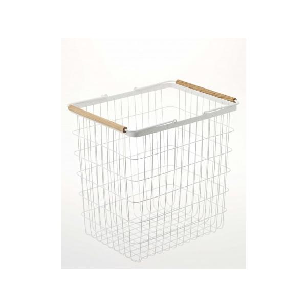 ●整列したスチールの線材とやさしい表情の木との組み合わせが美しいランドリーバスケット。