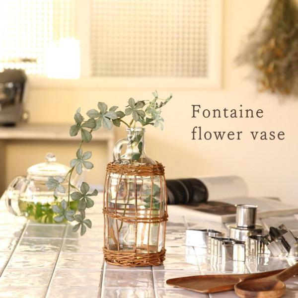 ●FONTAINE かご編みガラスフラワーベース ボトル●職人の技術が詰まった、熟練の職人にしか作り出せないアイテム。●ガラスの形状にぴったり合わせて柳のカゴを編み込んだフラワーベースです。●柳の温かみが感じられ、ナチュラルテイストのインテ...