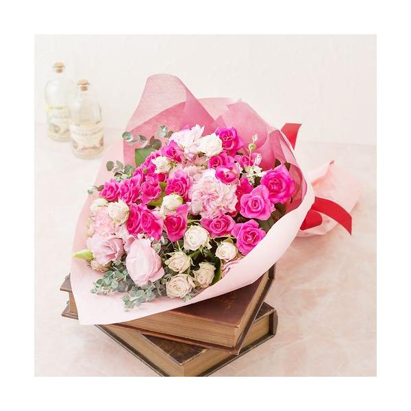 ショッキングピンクとベビーピンクのミニバラ、フリルが可愛いトルコキキョウとカーネーション等をたっぷり華やかに合わせました。幸せの象徴とされる「ピンク」の花々にシルバーグリーンを添えて大人の雰囲気と気品をプラスしました。フランス語で「モンクー...