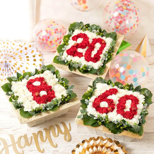 お誕生日、結婚記念日、開店お祝い…”メモリアル・ナンバー”を贈ってみませんか？還暦のお祝いには60、錫婚式（結婚10周年）には10…等、数字のバリエーションをご用意しました。祝い事に伝統的に使われる紅白2色の花々で彩られ、両手に抱えるほどた...
