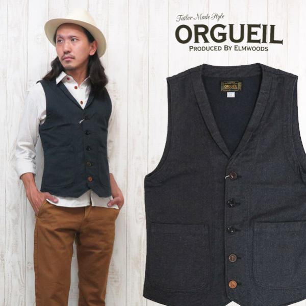 オルゲイユの定番モデル。手触りが良くハリ感のあるコットン100％の生地。しっかりとした生地で製作したカジュアルワークベストですが、下部のデザインやショールカラーの衿元などどことなく上品さを感じる事が出来るアイテムです。■オリジナルのナットボ...