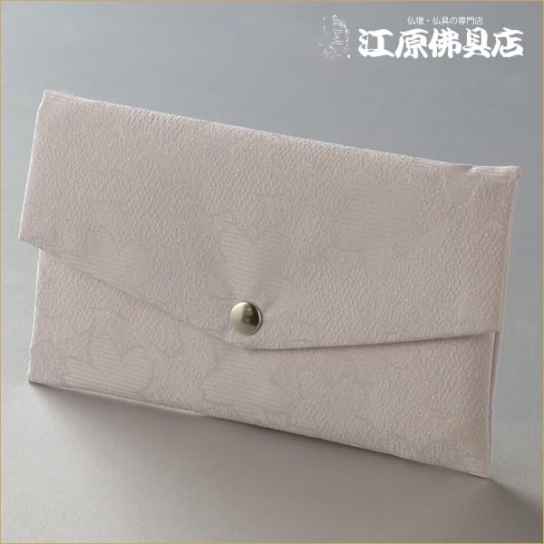 《材質》ポリエステル100%《サイズ》【横幅】約16cm　【縦幅】約10cm《商品説明》●布地の色は淡い藤色です●生地に桜の花の地模様がありラメも少し光って上品な感じです※袋に入れる時は念珠の輪の中に房を入れて収められます