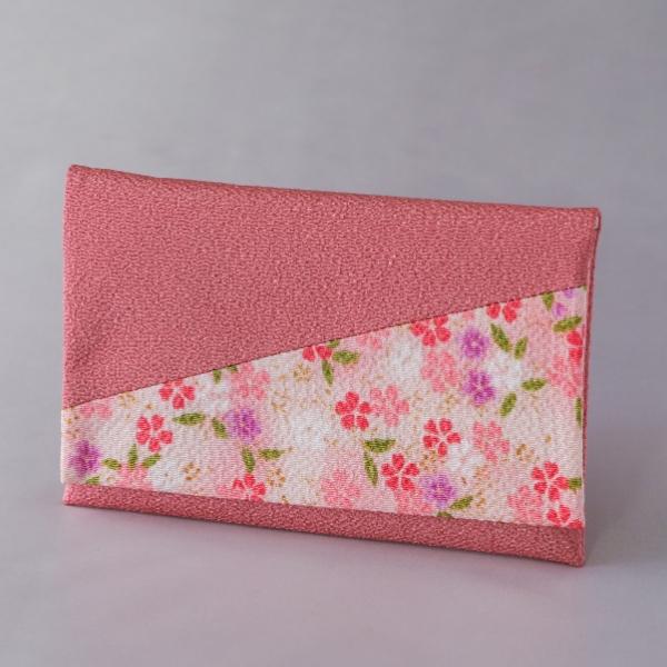 《サイズ》【横幅】約15.4cm　【縦幅】約10.4cm《商品説明》●ちりめんの素材が上品な仕上がりとなっております。※袋に入れる時は念珠の輪の中に房を入れて収めます。