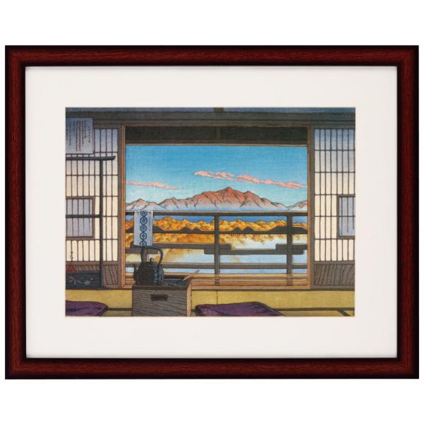 新湯温泉旅館・下藤屋の客室から描いた光景。朝日に照らされた山脈と色づいた樹々が美しい。■ 川瀬巴水［略歴］明治16年(1883)、東京市芝区(現港区新橋五丁目)生まれ。25歳の時に鏑木清方の門をたたく。最初は年齢を理由に入門を断られたが、再...