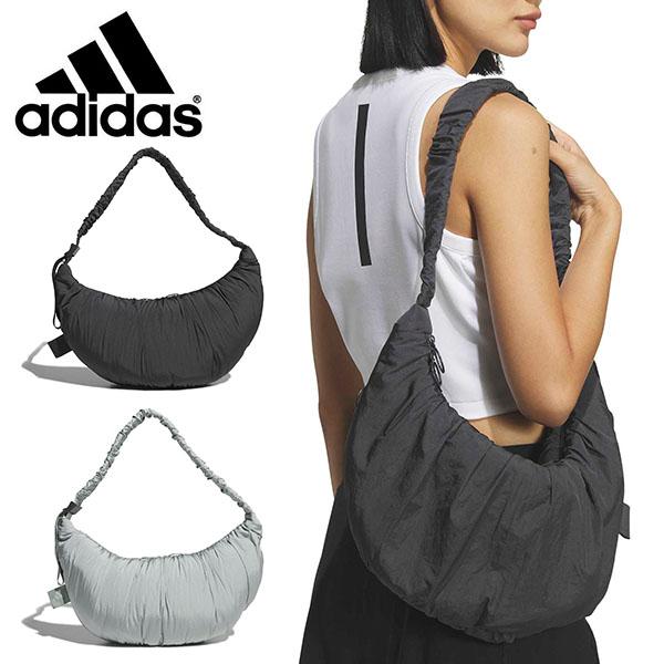 adidas (アディダス) ウィメンズMH ショルダーバッグ になります。レディース・女性・婦人ソフトで超軽量なナイロン素材を使用したショルダーバッグ。素材の特徴を生かしてバッグ全体にギャザーを入れ、女性らしい柔らかいデザインに仕上げまし...