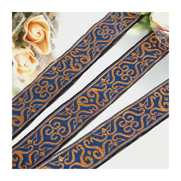 ブルーとゴールド系のジャカードリボンになります。ルネッサンス/ヴィクトリアン調の衣装デザインに理想的です。コスチューム、新体操、社交ダンス、バトントワリング、レオタード、ベリーダンス、フィギュアスケート、バレエ衣装、ドレス、服飾、ステージ衣...