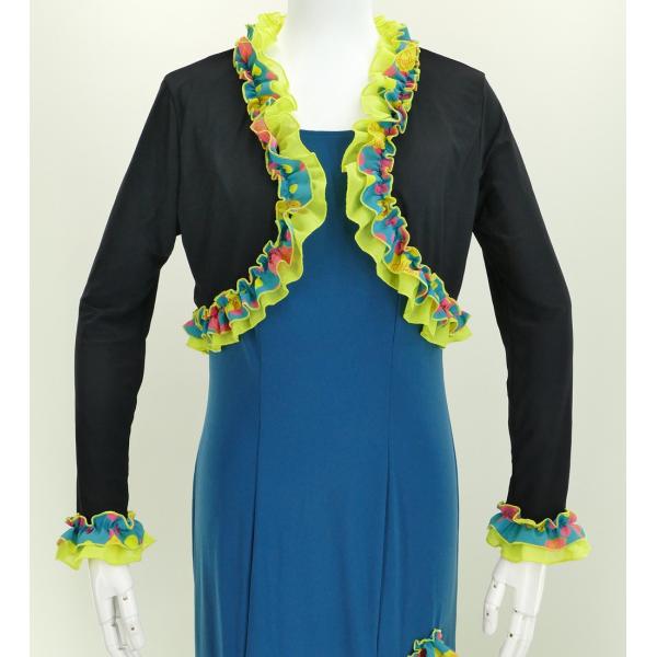 伸縮性があり、動きやすいボレロです。シンプルなデザインに、ローズと水玉のフリルとシフォンの2段重ねにすることで、軽やか且つ、見た目にも美しく華やかな印象を与えてくれます。身丈：36.5cm適応ヌード寸法：バスト80〜93cm素材：ポリエステ...