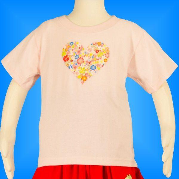 かわいいフラガールとハイビスカスを胸元にプリント。バックにはハイビスカスのプリントでフラケイキのTシャツはパウスカートにもコーディネートしやすく、普段使いもできます。身丈：42cm実寸：バスト64cm／ ウエスト69cm 素材：綿100%※...